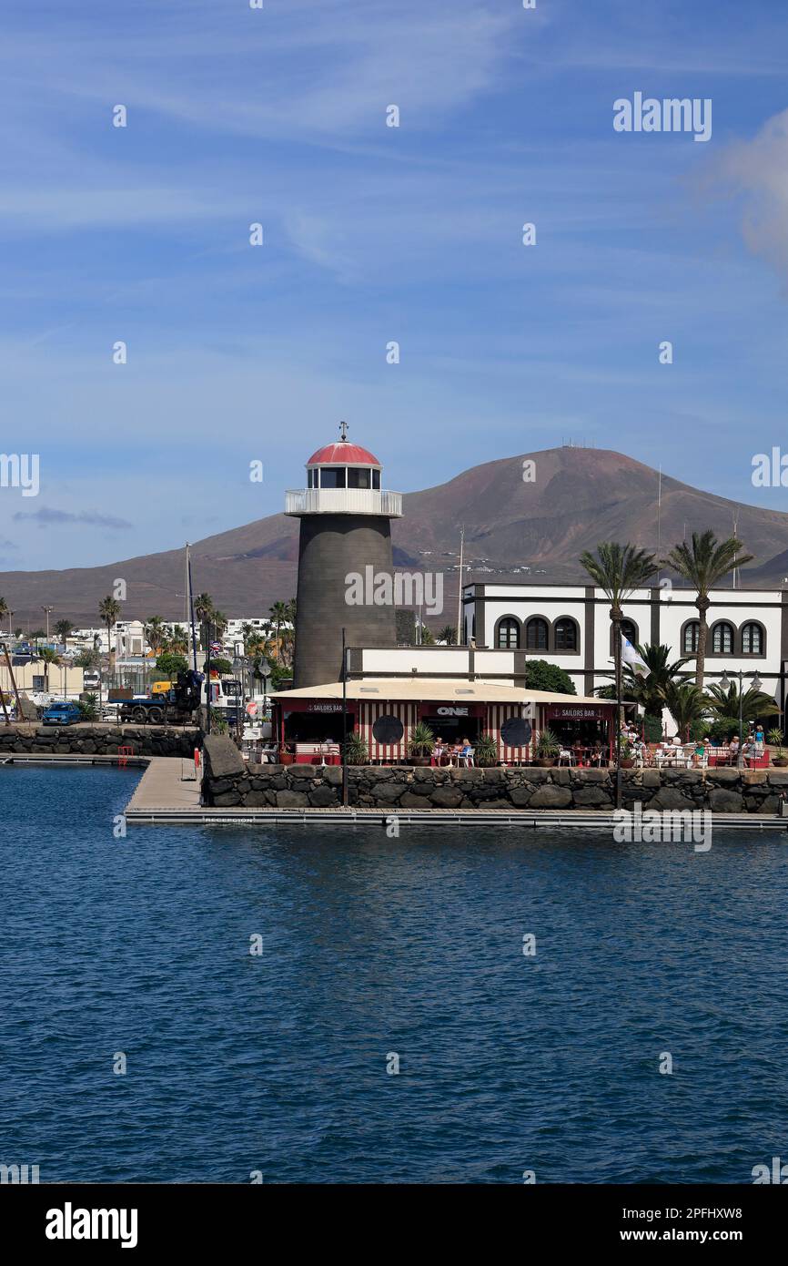 Rubicon Marina Playa Blanca with cafes and lighthouse. February 2023 ...