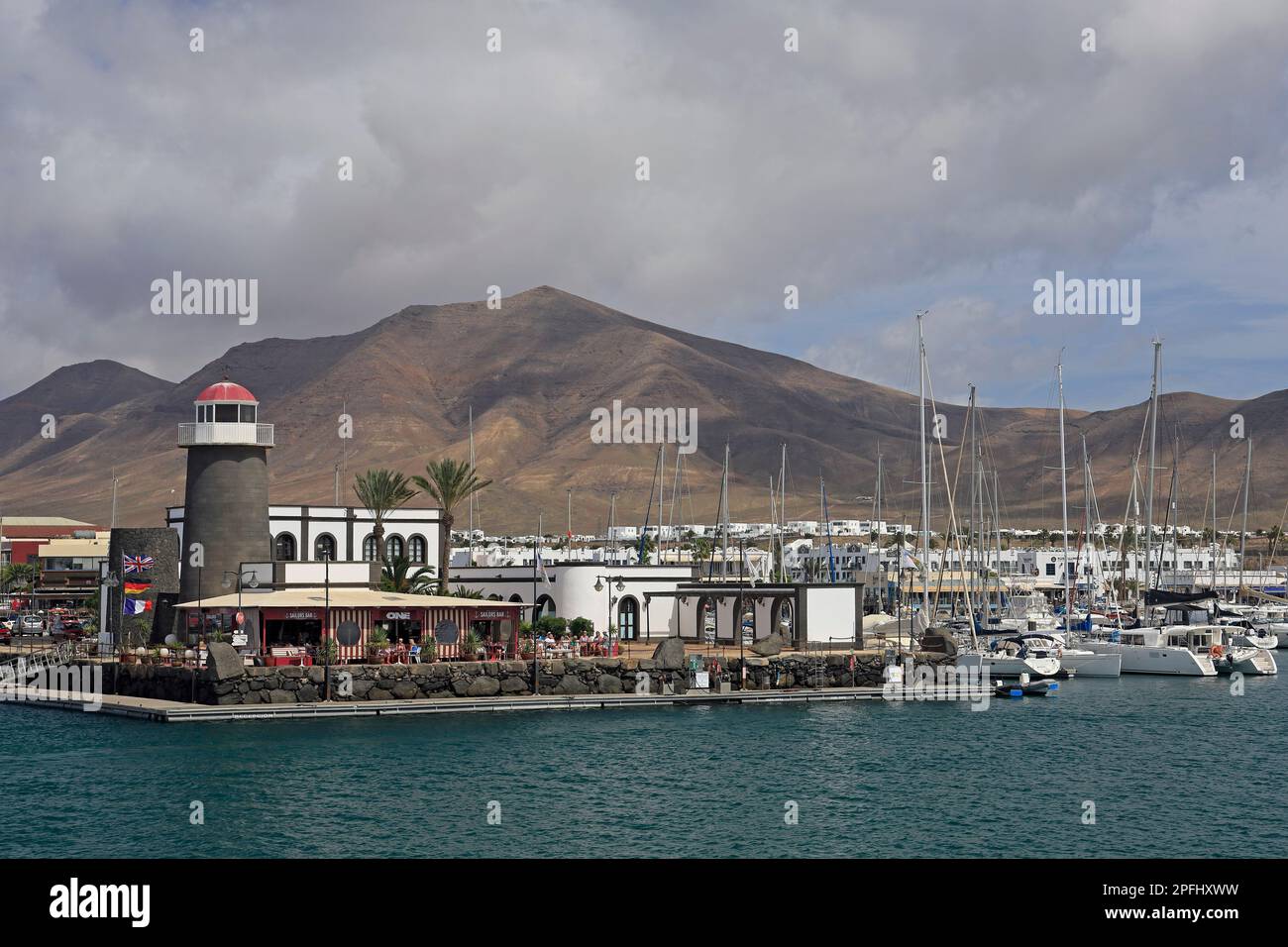 Rubicon Marina Playa Blanca with lighthouse. February 2023 Stock Photo ...