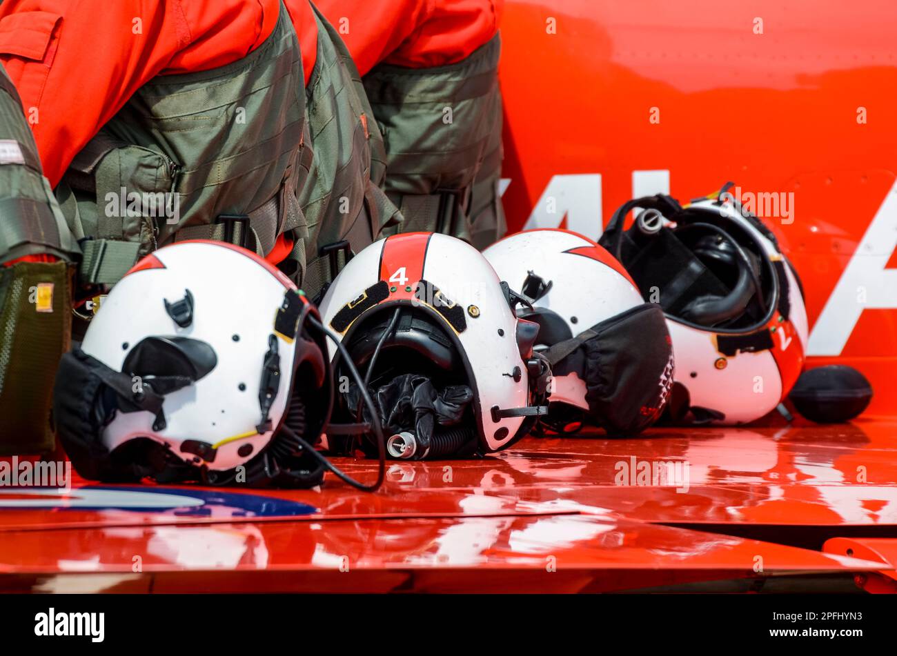 Royal Air Force, RAF Red Arrows display team pilots helmets on wing of ...