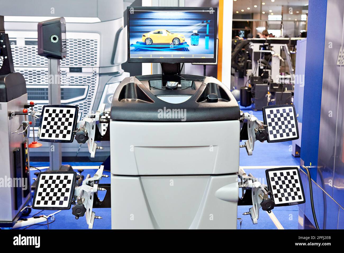 Wheel alignment stand with infrared communication Stock Photo - Alamy