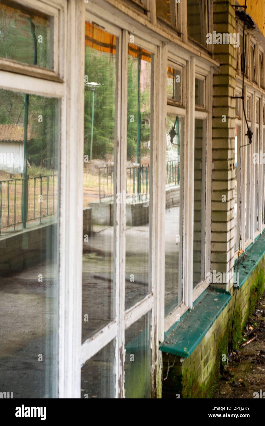 An interesting view of old windows in a forgotten building in the style ...