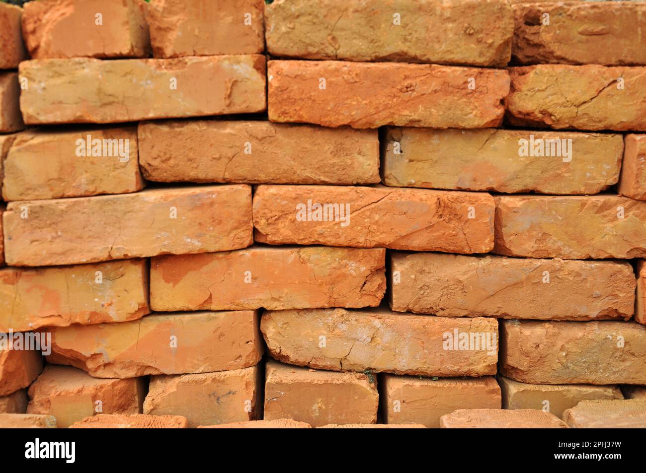 In the pile is a ready-made fired brick made of clay Stock Photo - Alamy