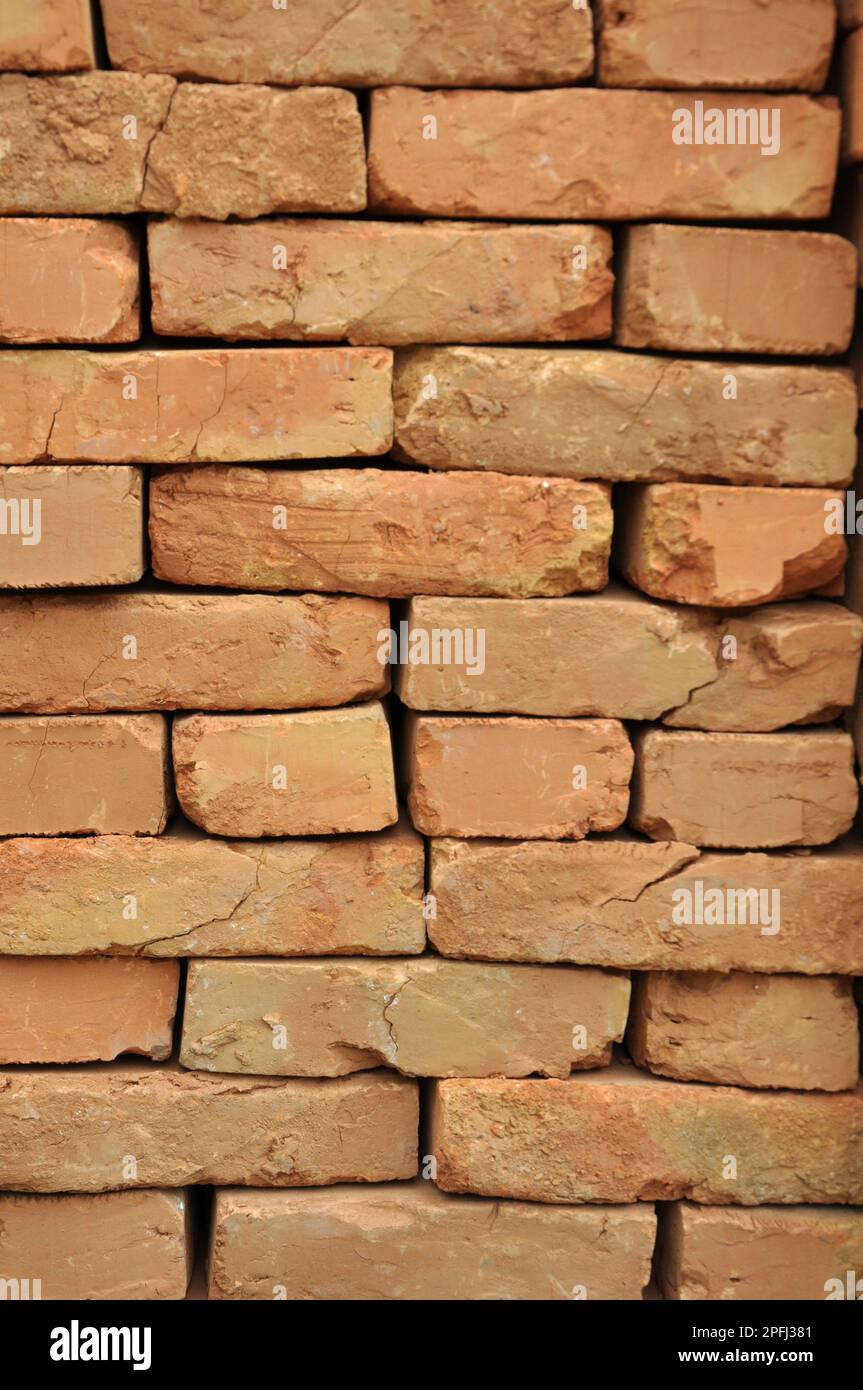 In the pile is a ready-made fired brick made of clay Stock Photo - Alamy