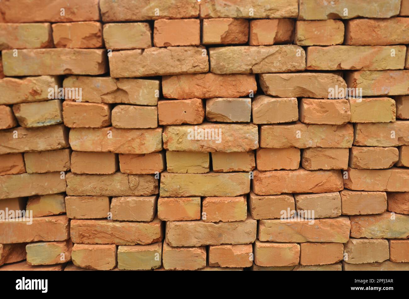 In the pile is a ready-made fired brick made of clay Stock Photo - Alamy