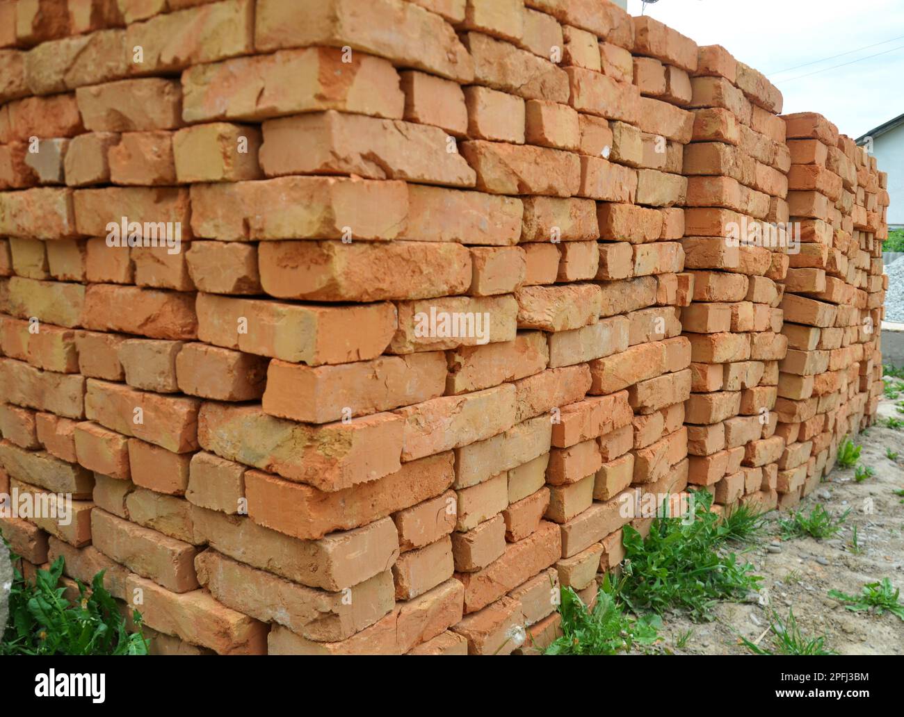 In the pile is a ready-made fired brick made of clay Stock Photo - Alamy