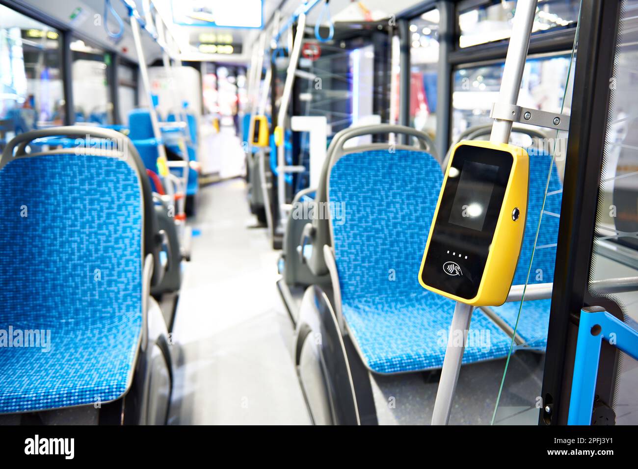 Modern touch payment terminal in bus Stock Photo - Alamy