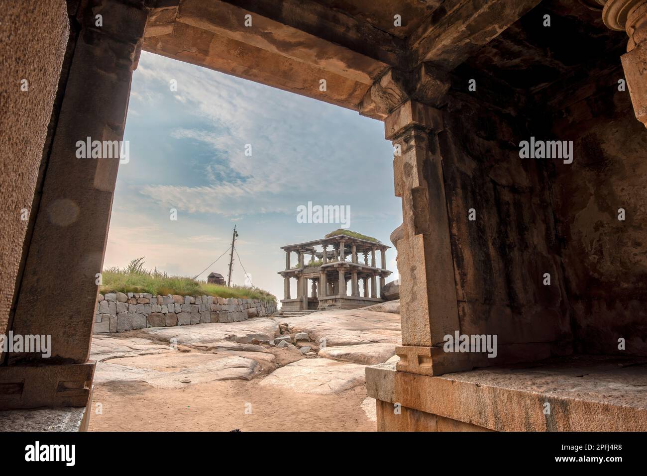 A two-storey granite pavilion on Hemakuta Hill in Hampi. Hampi, the ...