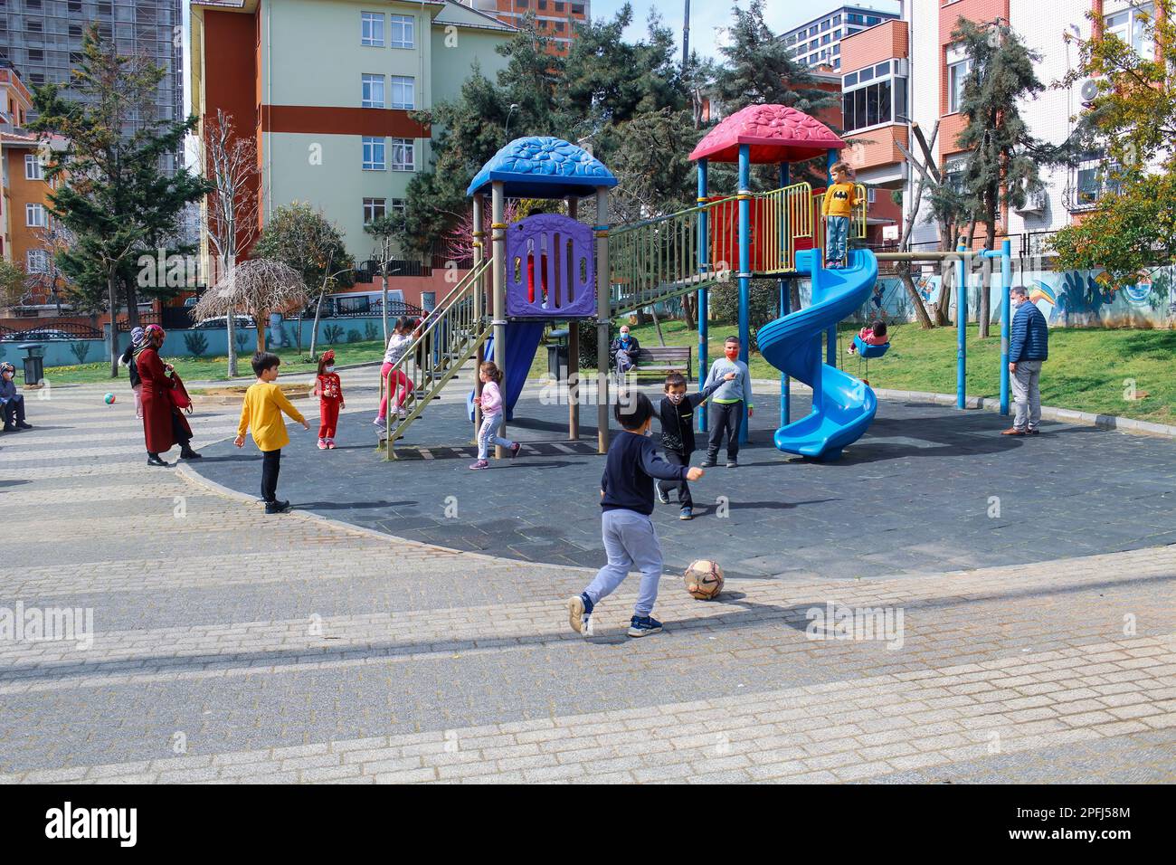Istanbul, Turkey - 03.17.2023: some children playing football in a ...