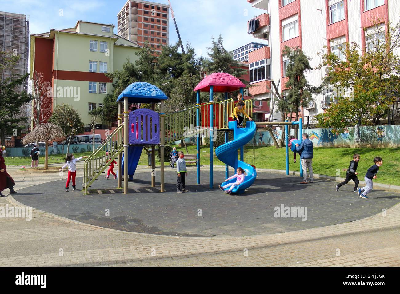 Istanbul, Turkey - 03.17.2023: several kids playing in public park and ...