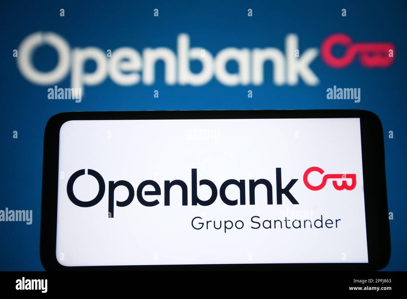 In this photo illustration, an Openbank (Open Bank, S.A.) logo is seen on a smartphone Stock ...