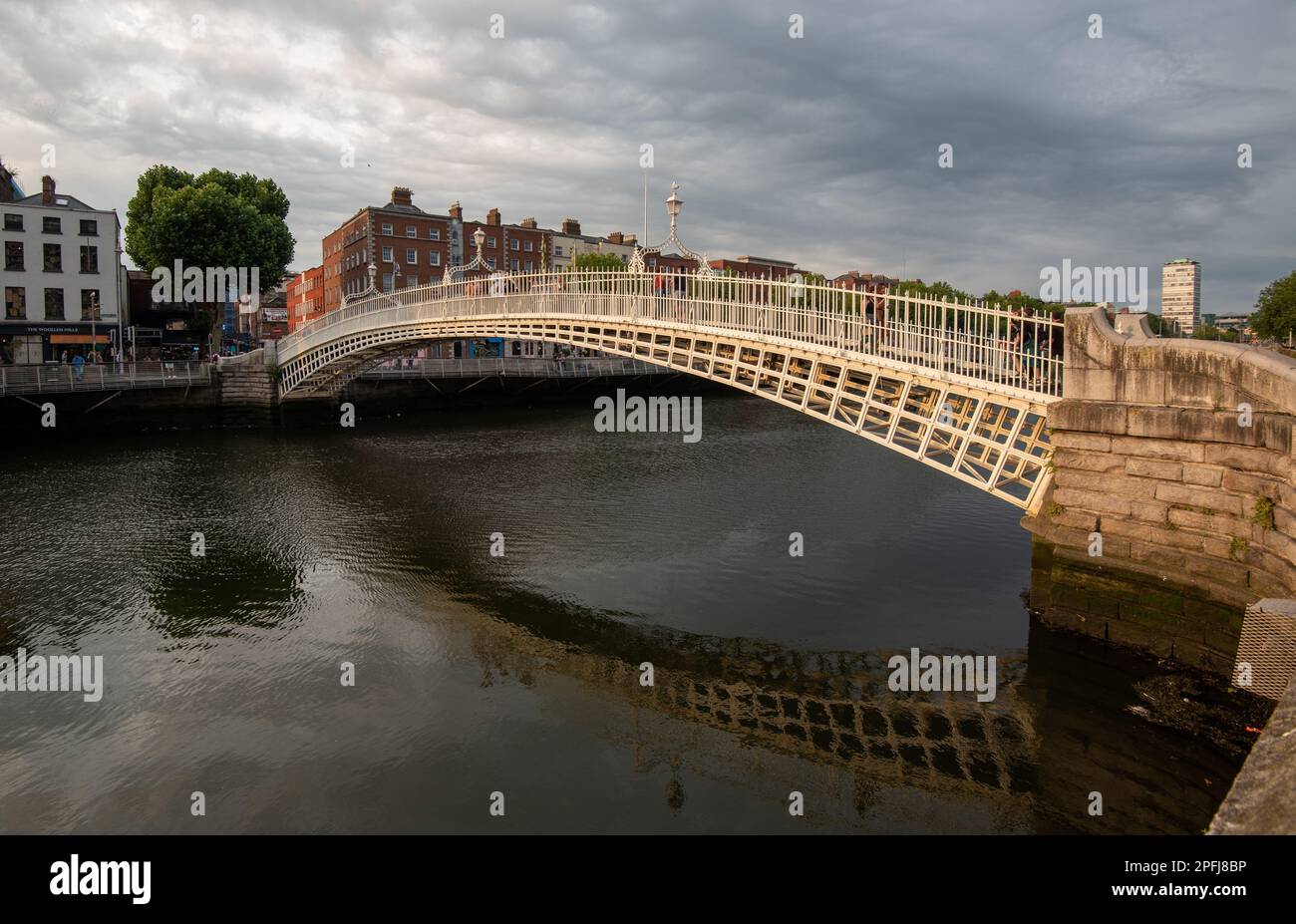 Famous landmark of Ha' penny bridge over the river liffey Dublin ...