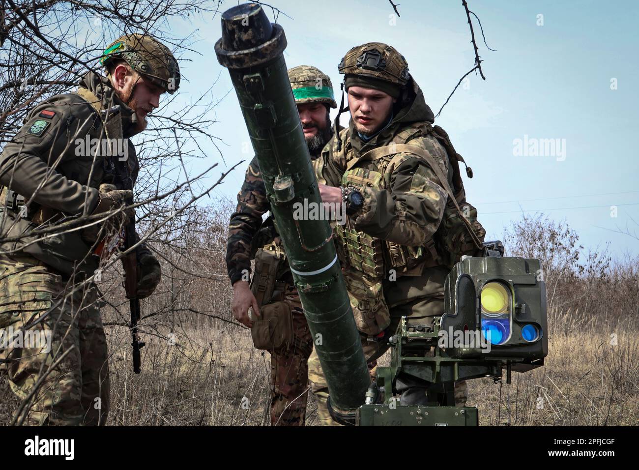 Ukrainian soldiers install an anti-tank missile systems 'Stugna' near ...