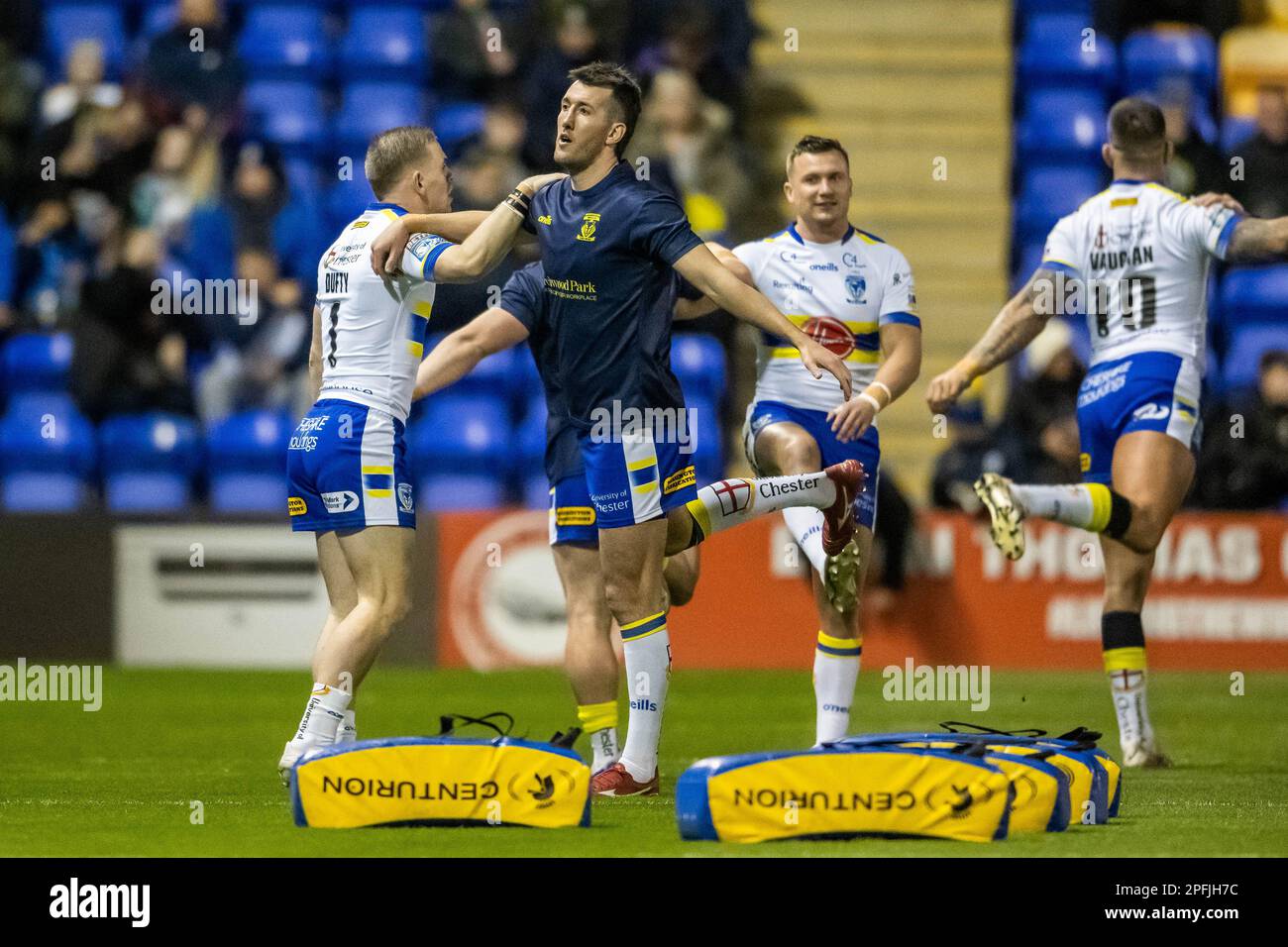 Stefan Ratchford #4 of Warrington Wolves stretches during pre match ...