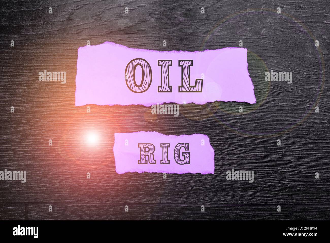 Text caption presenting Oil Rig. Word Written on large structure with ...