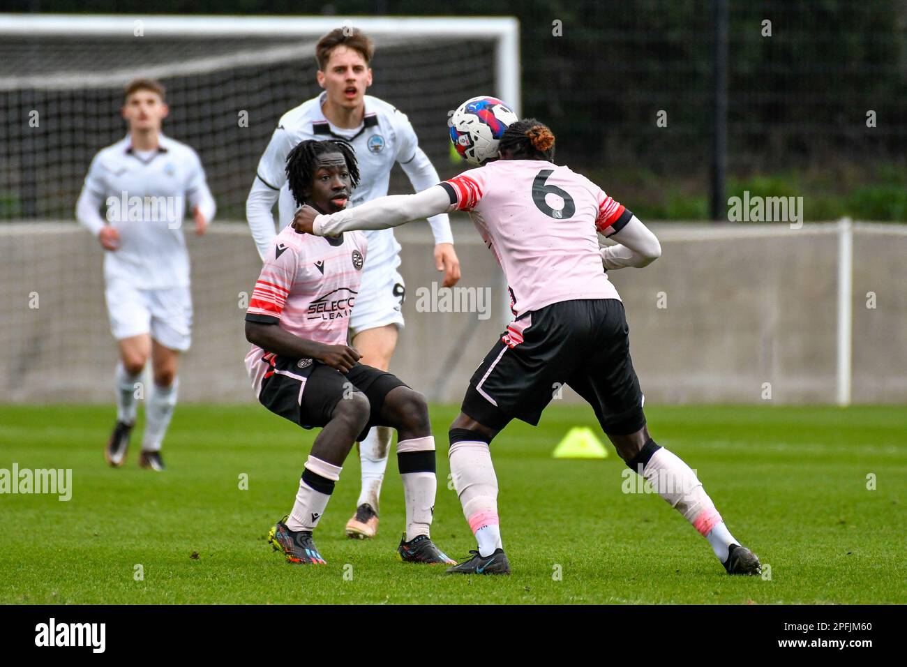 Swansea, Wales. 17 March 2023. Geneiro Maragh of Reading heads the ball ...