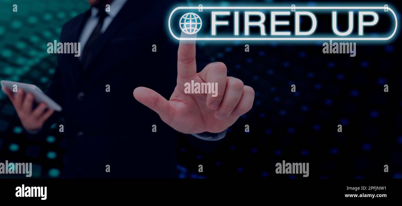 Hand writing sign Fired Up. Business idea means that someone energized ...