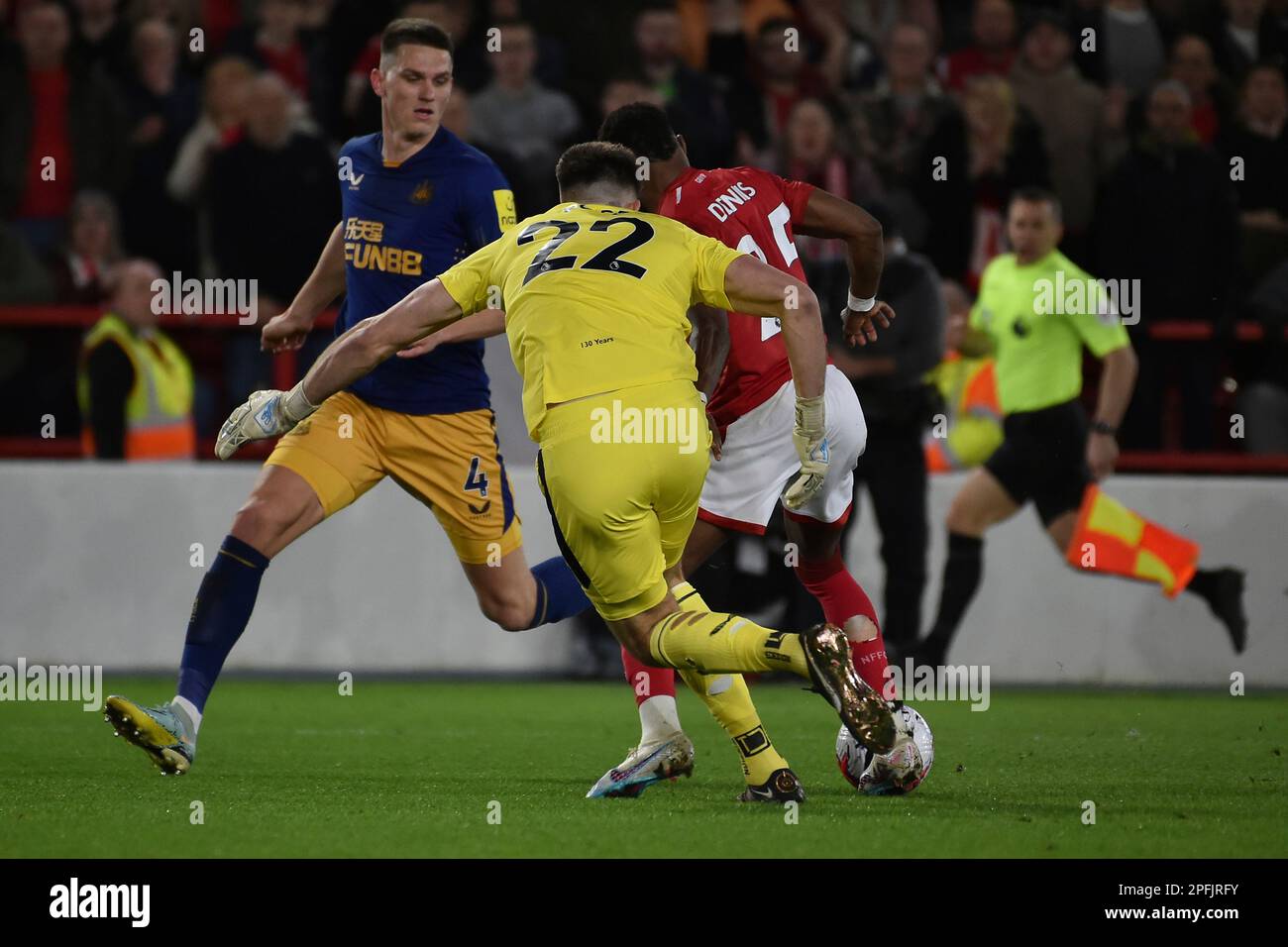 Nottingham Forest's Emmanuel Dennis, right, passes Newcastle's Nick ...