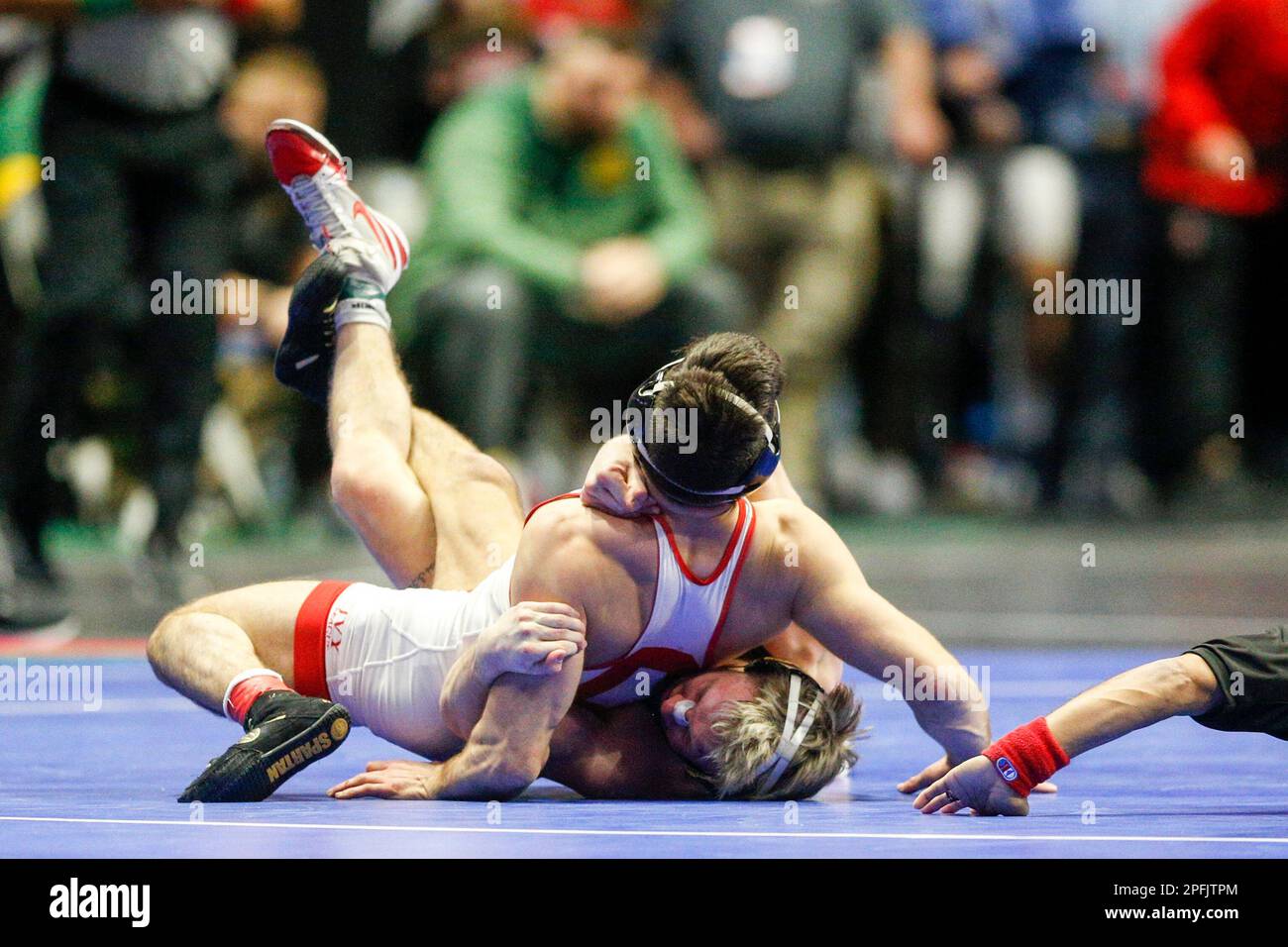 Cornell's Yianni Diakomihalis scrambles with Iowa's Max Murin at the ...