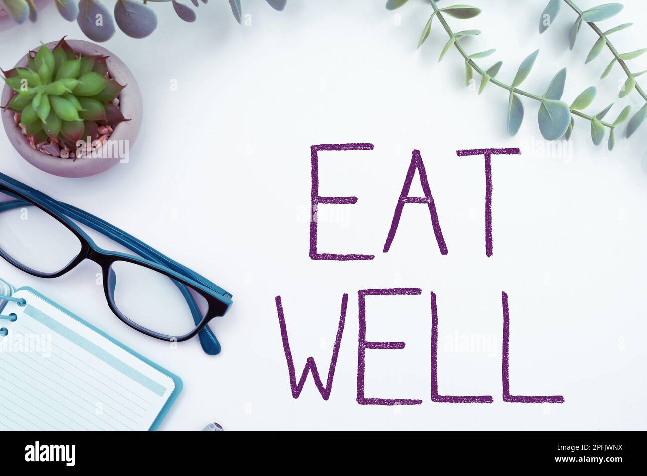 Hand writing sign Eat Well. Business idea Practice of eating only foods ...