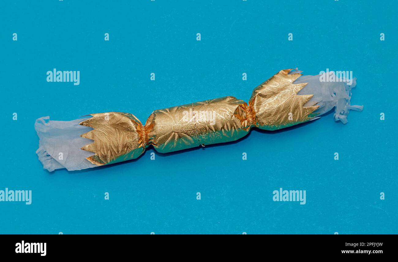 Festive Christmas fire cracker cardboard paper tube wrapped in gold ...