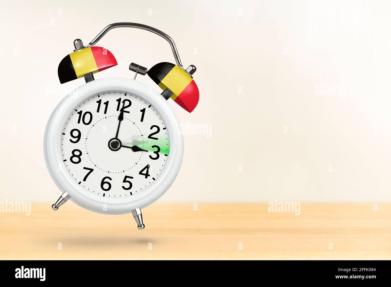 Time change in Belgium, spring forward. Summer time concept, over white ...