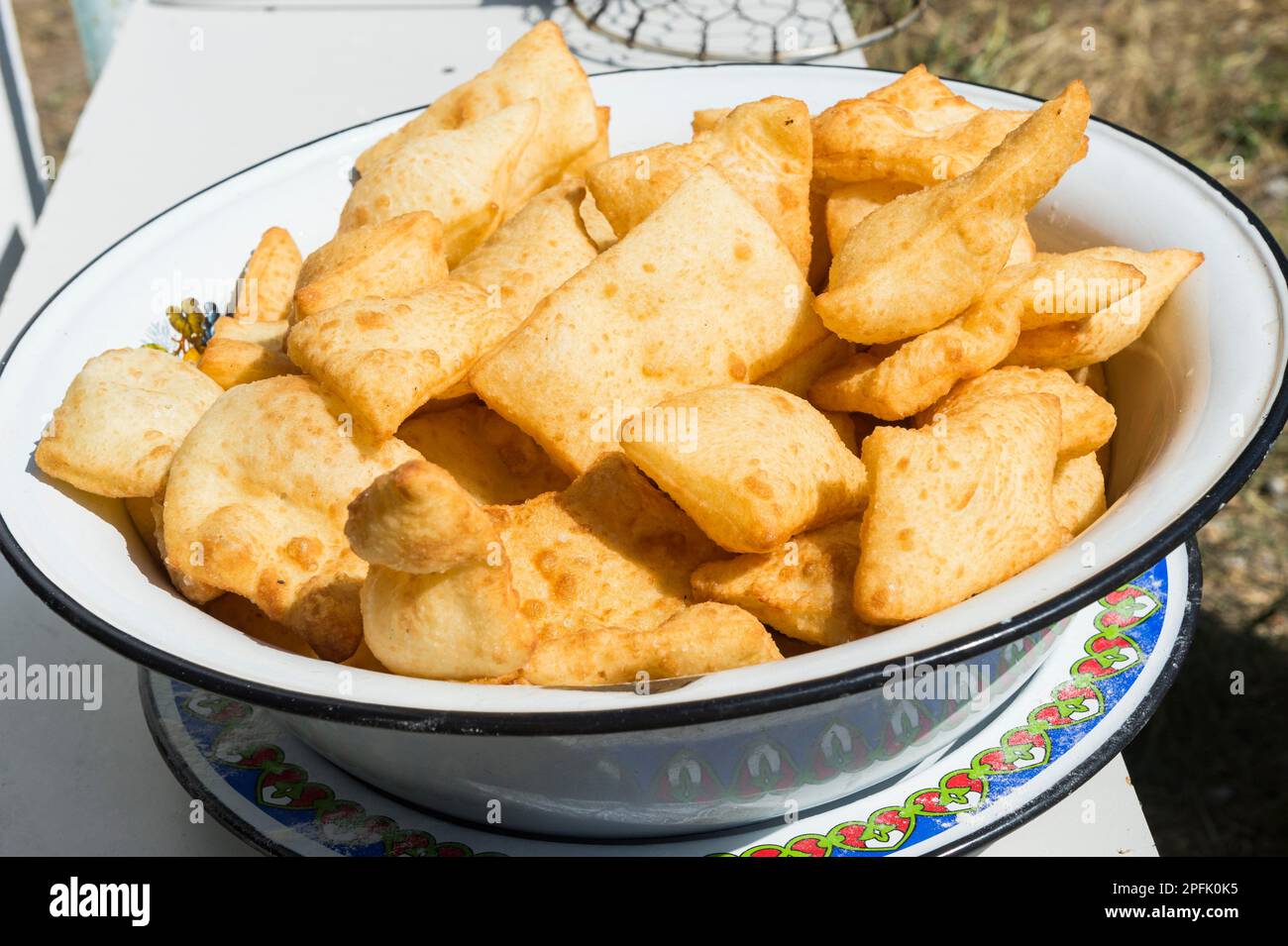 Plate of traditional local tandyr bread, Shymkent, Southern Region ...