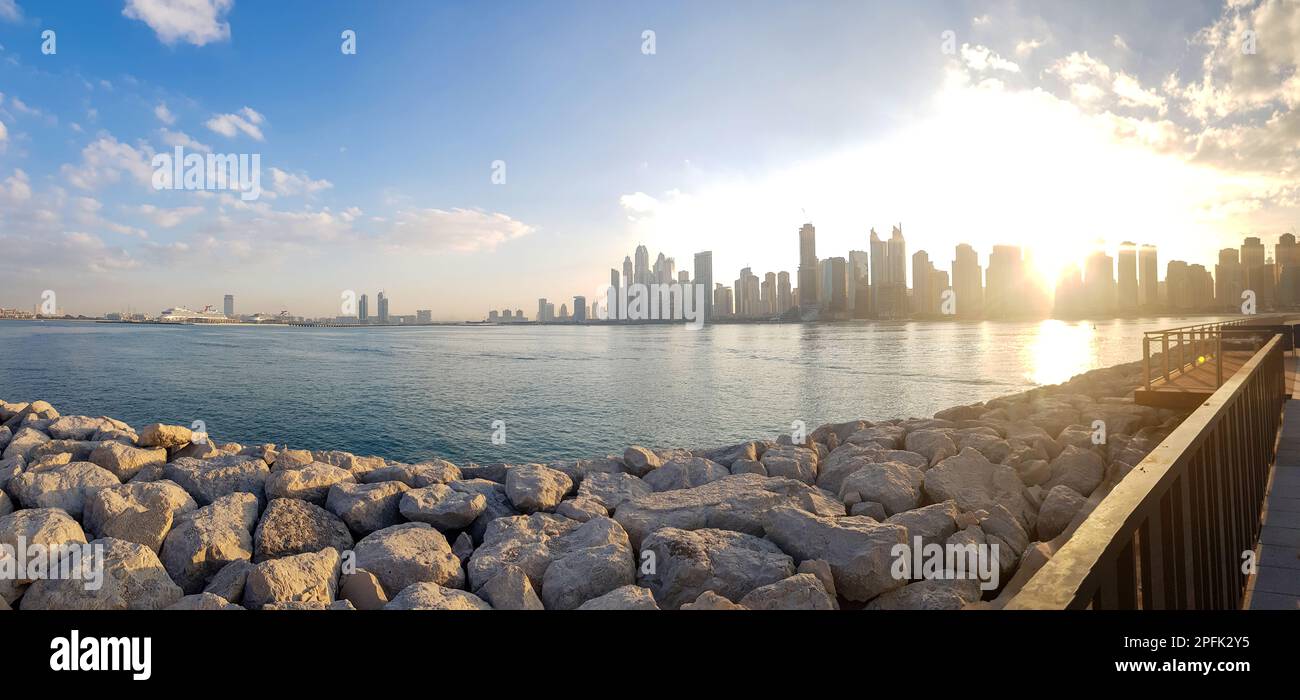 Panoramic view of Business Bay district with reflection in sea in ...