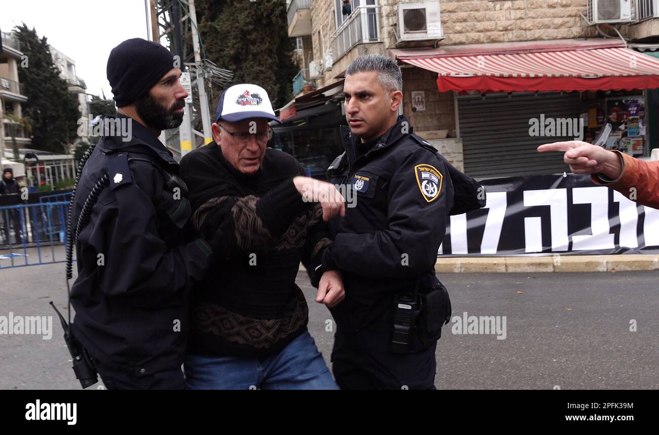 JERUSALEM, ISRAEL - MARCH 15: Police push back an elderly Israeli ...