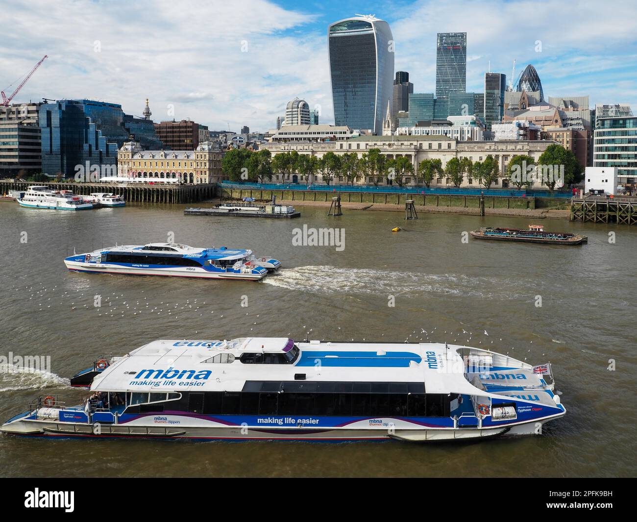 River Buses Cruising along the River Thames Stock Photo - Alamy