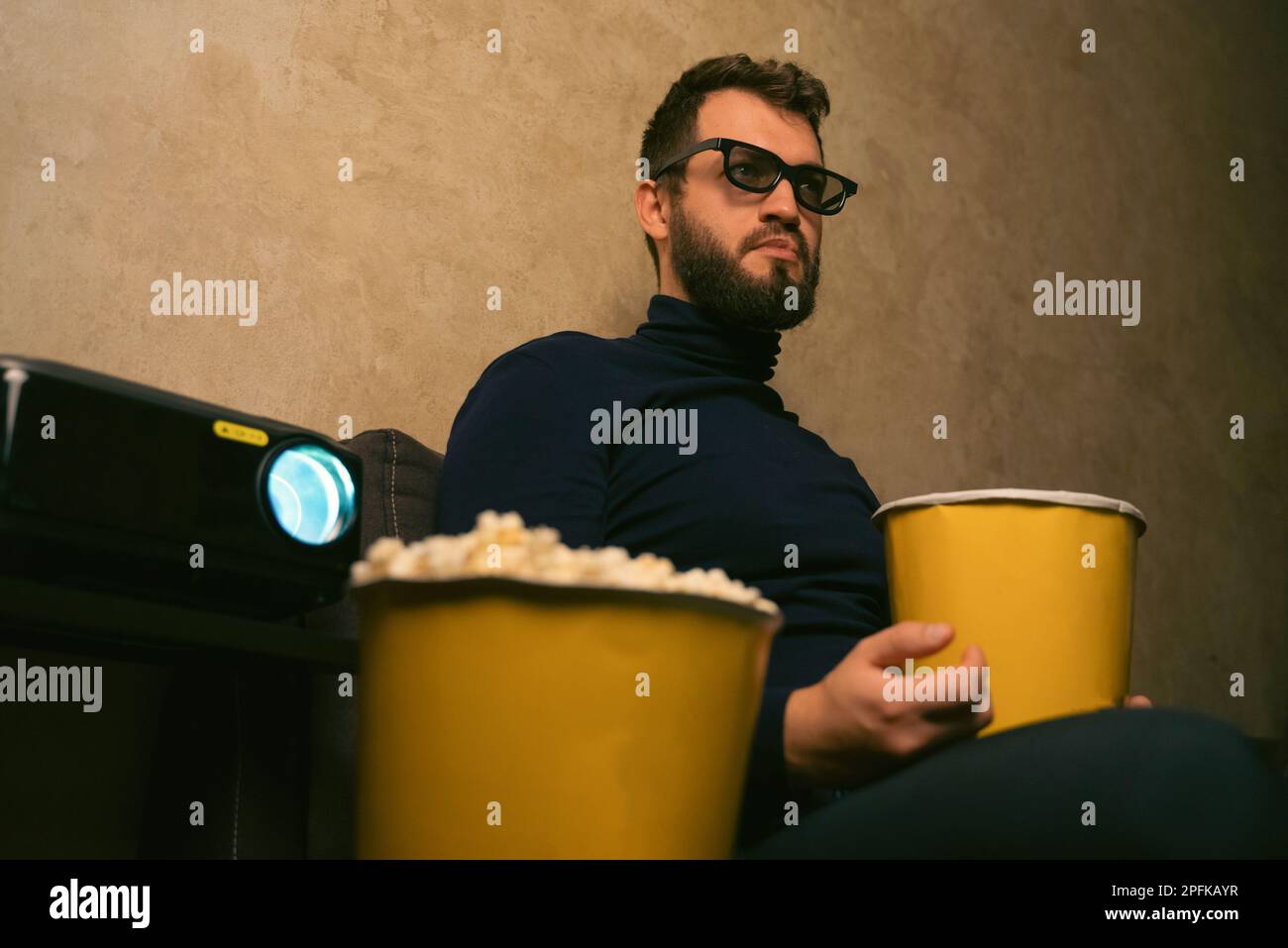 Excited Millennial Man Watching Movie Using Domestic Cinema Projector ...