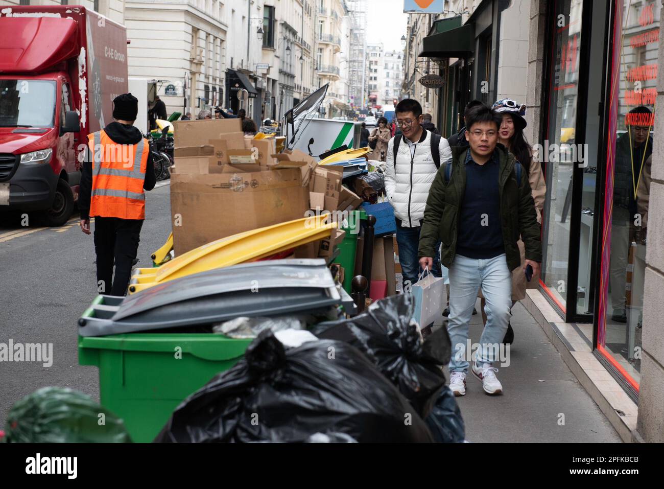 PARIS, FRANCE - MARCH 17: Rubbish and overflowing bins line the pavement during a strike by ...