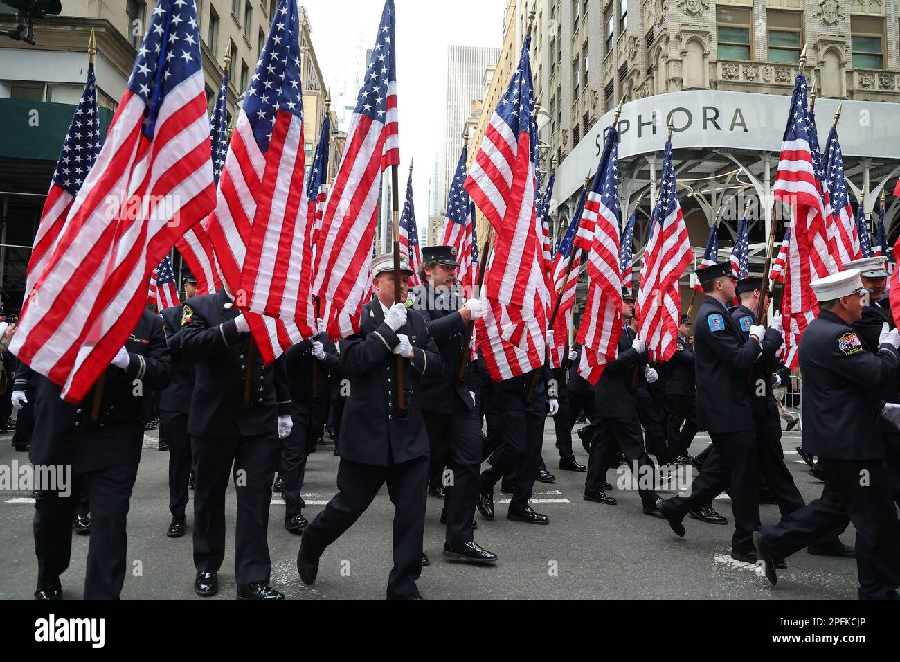 Members of the New York City Fire Department Color Guard carry flags ...