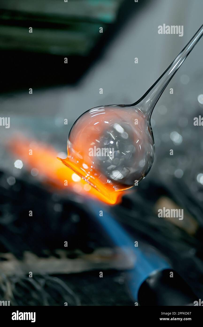 Closeup of a flame and melting glass piece Stock Photo - Alamy