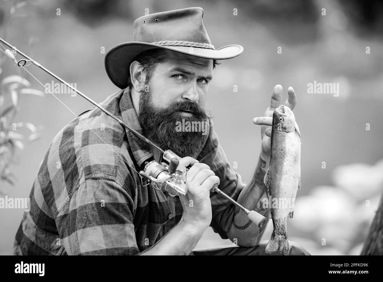 Bearded fisher. Male hobby. Successful fly fishing. Fisher masculine ...