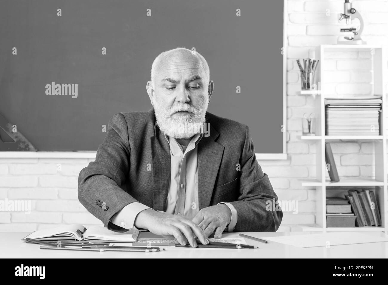 Professor in classroom at the school. A teacher who works ...