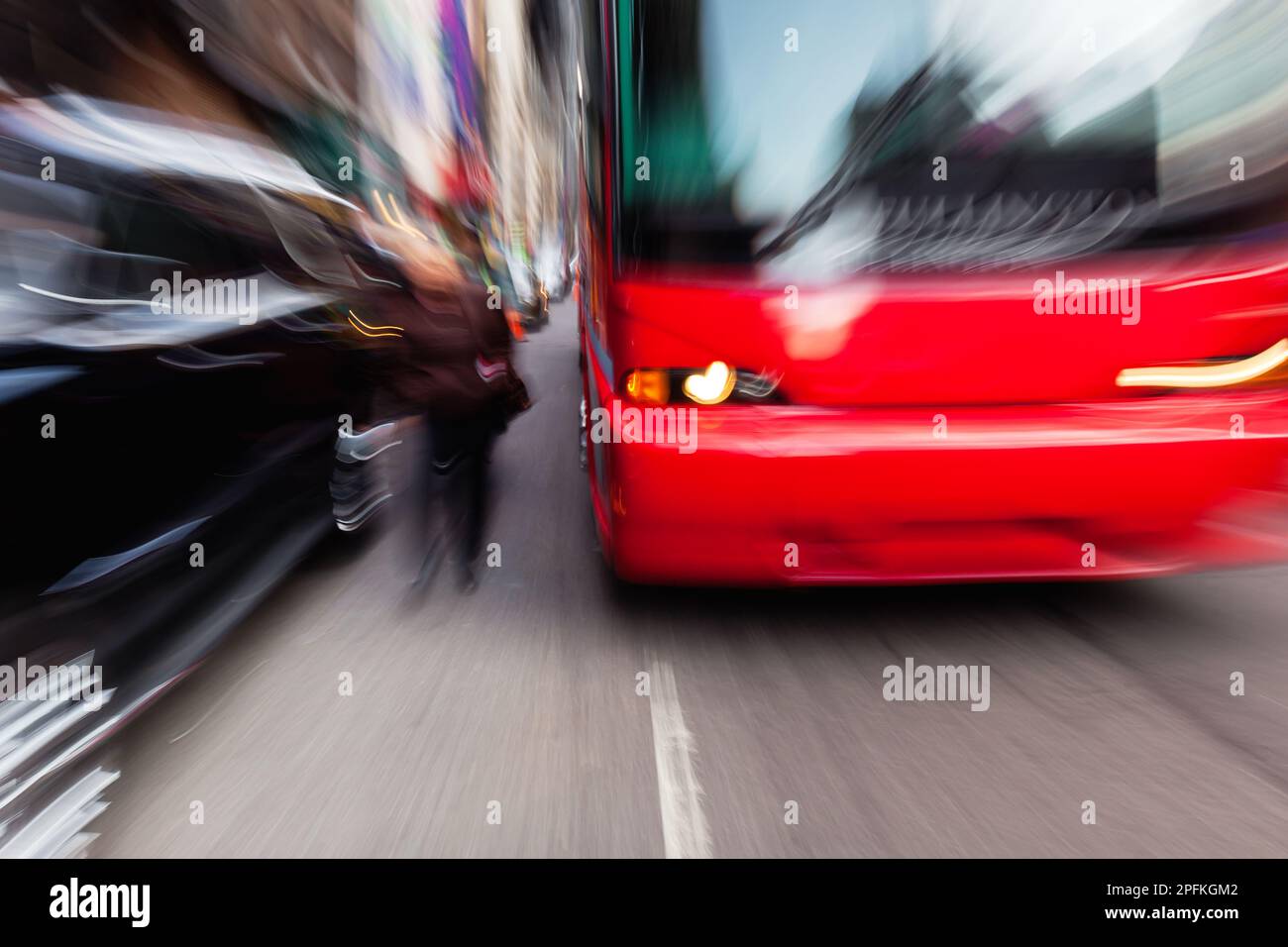 abstract picture with camera made blurry zoom effect of a city street ...