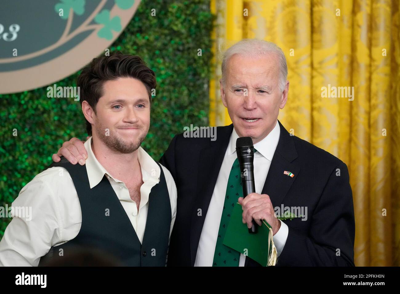 President Joe Biden stands with singer Niall Horan after he performed ...