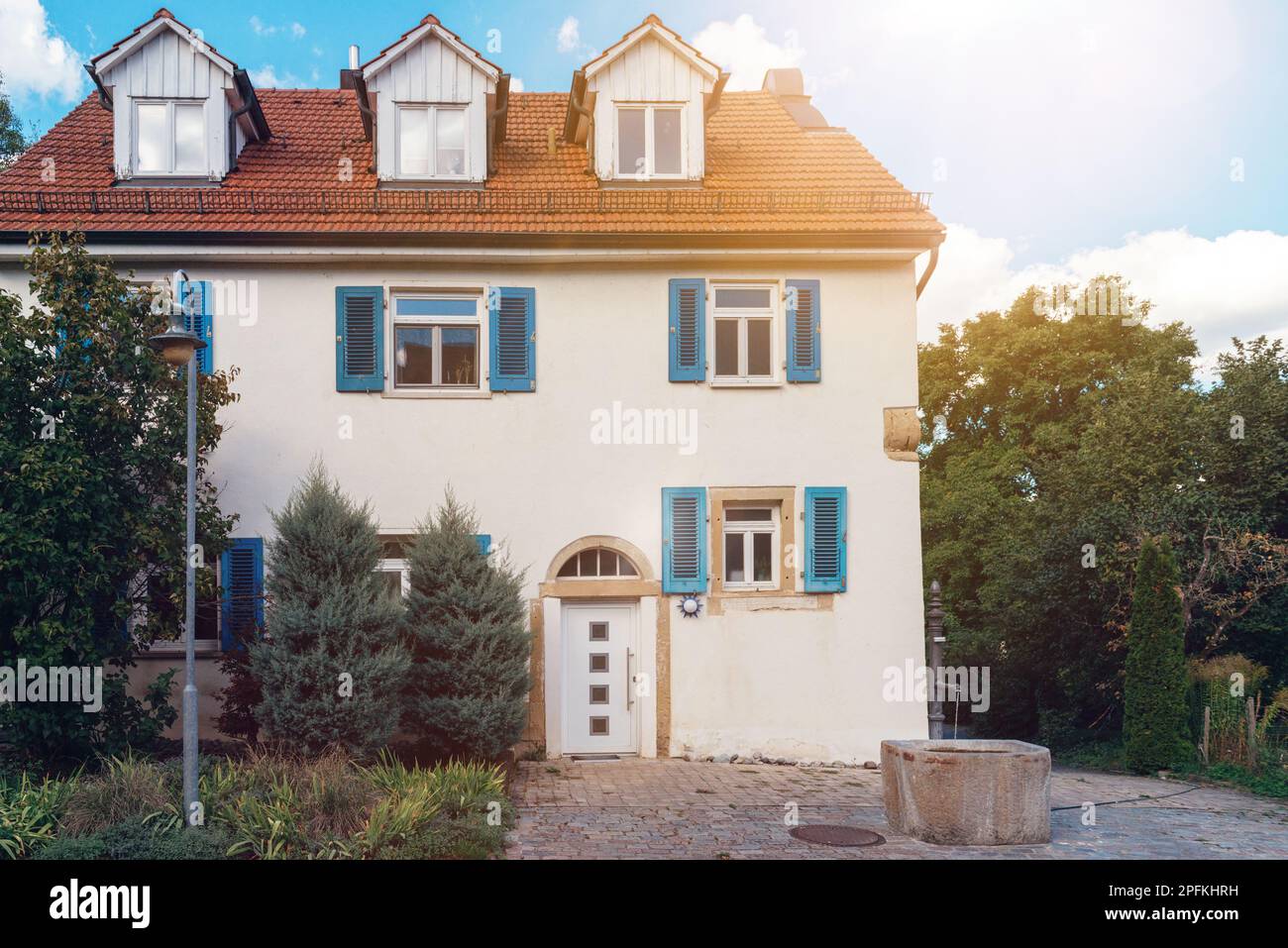 Traditional small house with beautiful outdoor decor facade in Germany ...