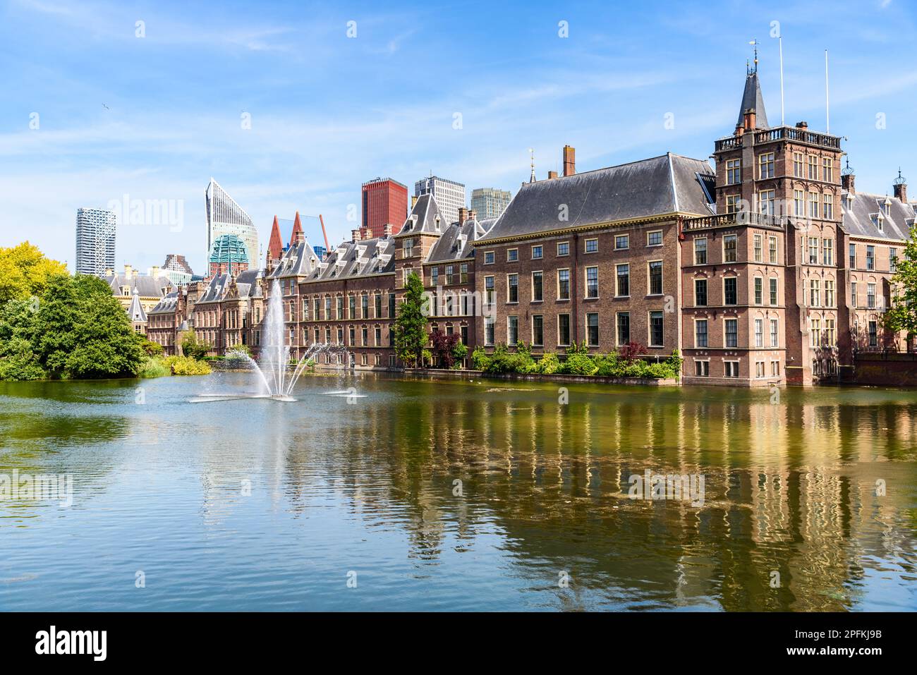 The Hague skyline with Binnenof palace and Hofvijver lake in foreground ...