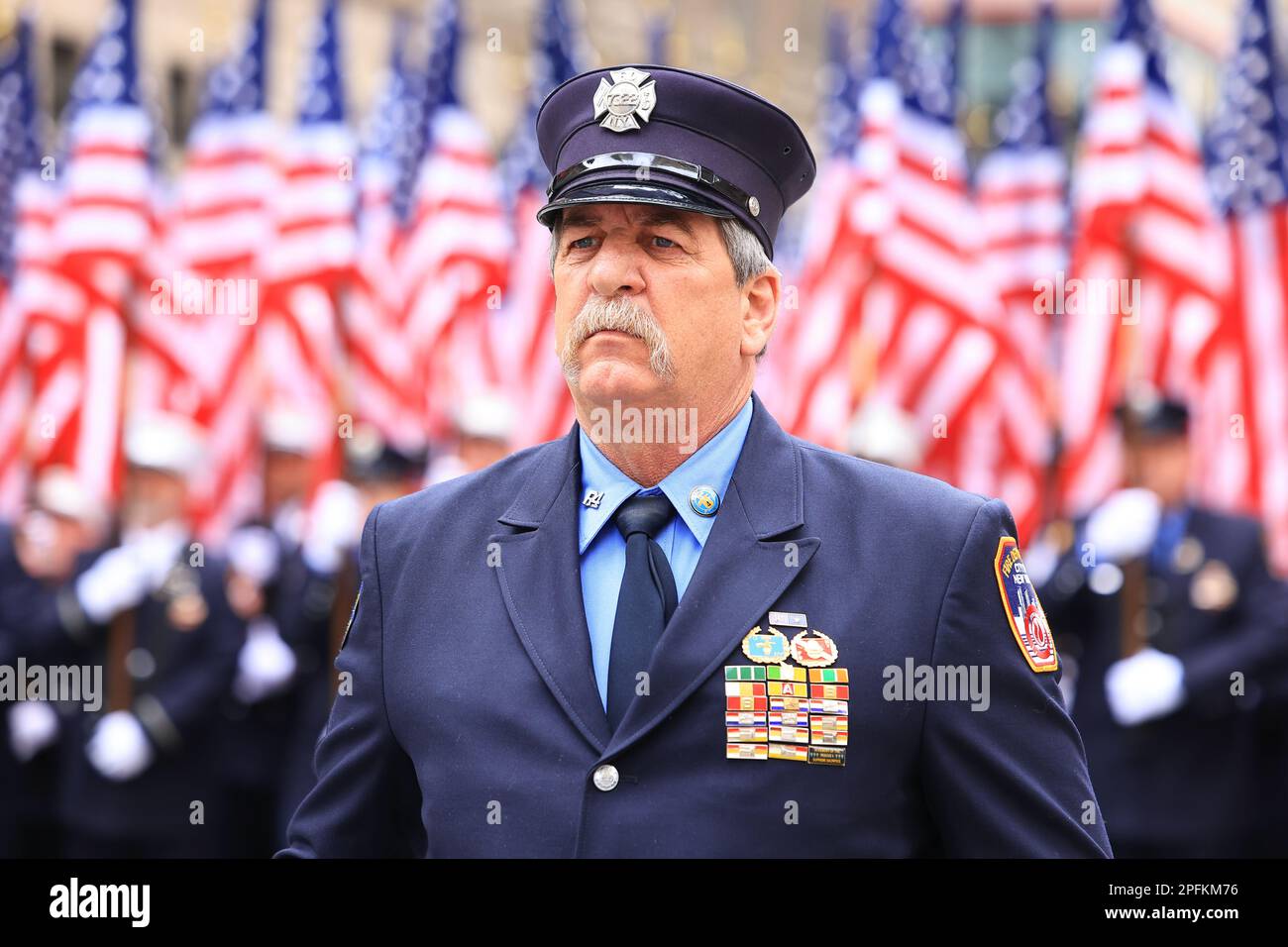 Members of the New York City Fire Department Color Guard carry flags ...