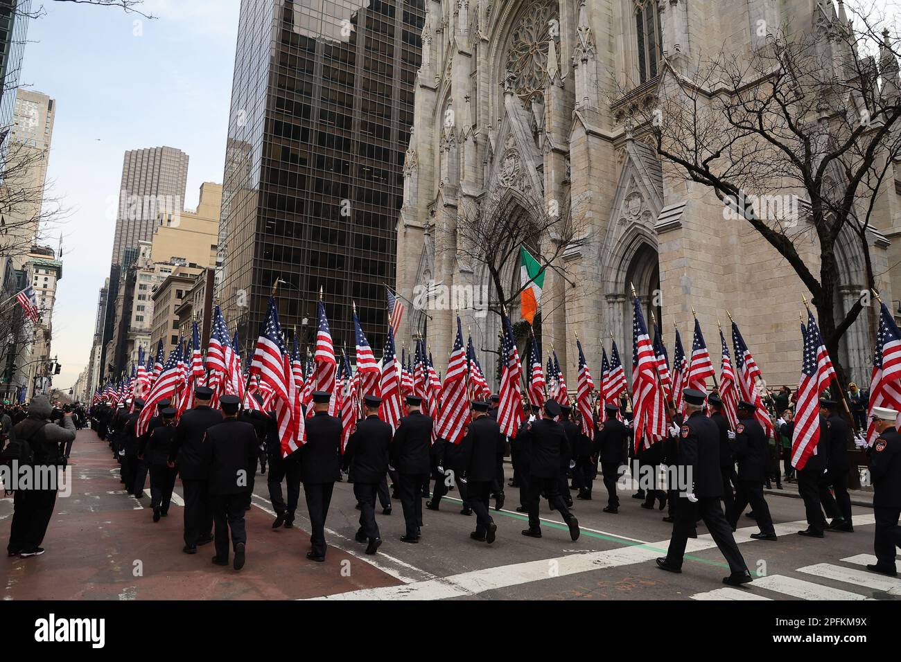 Members of the New York City Fire Department Color Guard carry flags ...