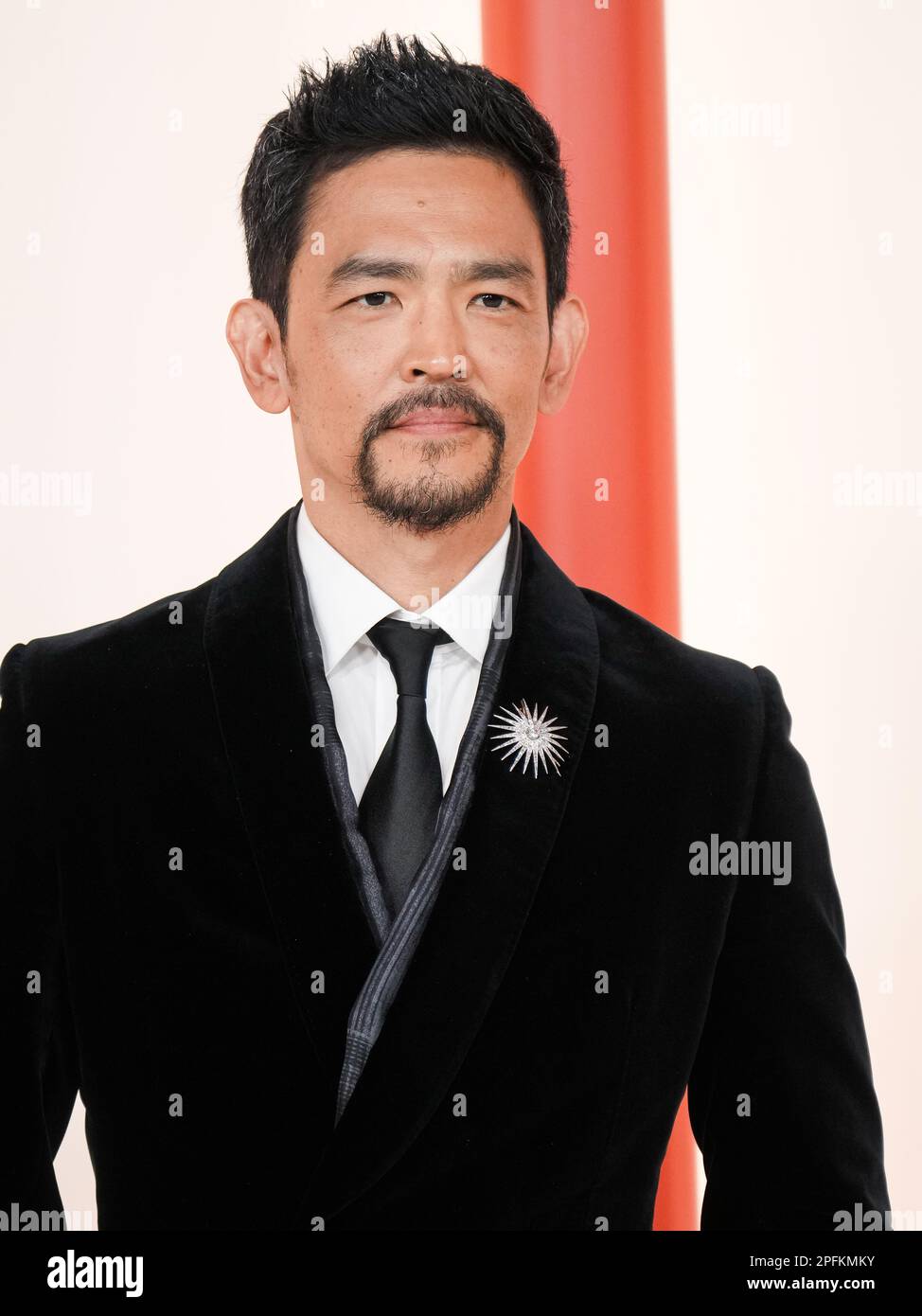 Los Angeles, USA. 12th Mar, 2023. John Cho walking on the red carpet at ...