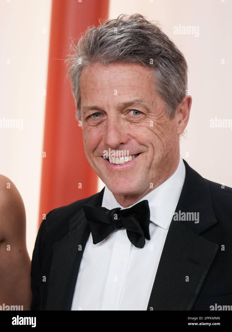 Los Angeles, USA. 12th Mar, 2023. Hugh Grant walking on the red carpet ...