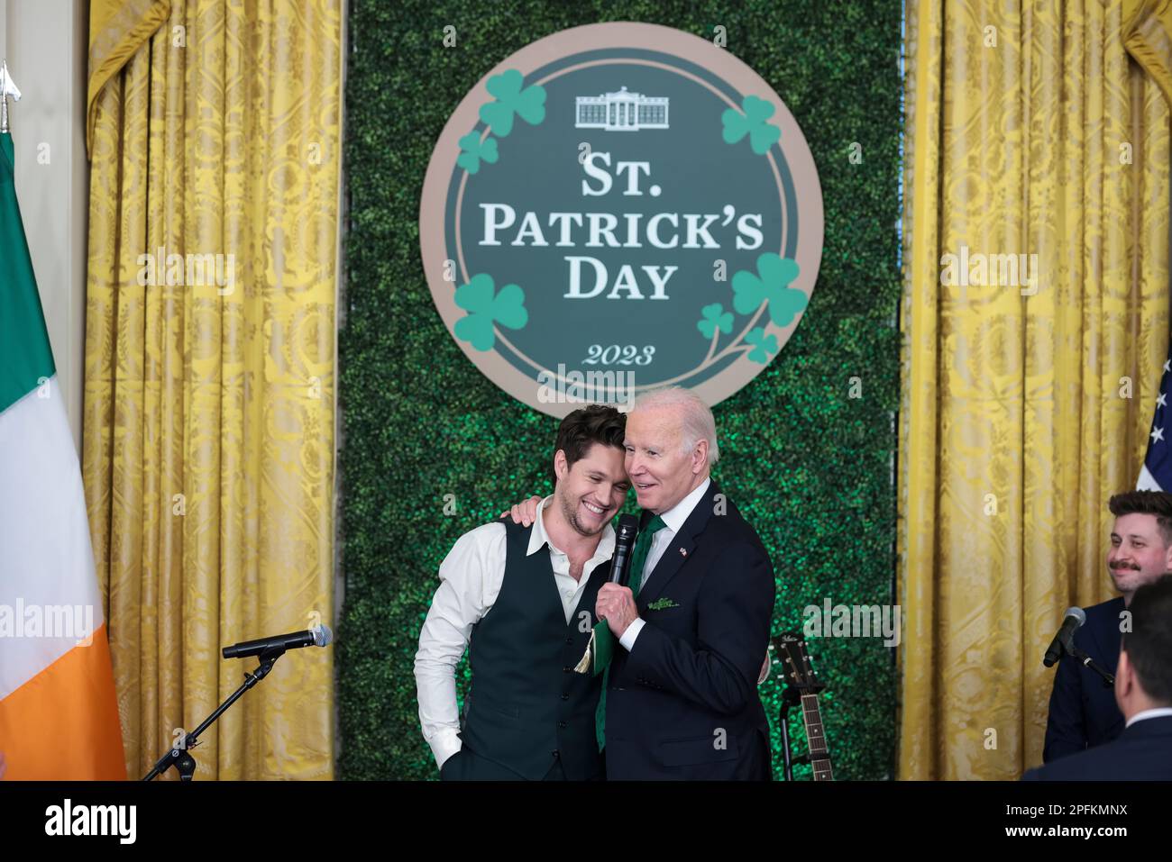 Washington, USA. 17th Mar, 2023. U.S. President Joe Biden embraces ...