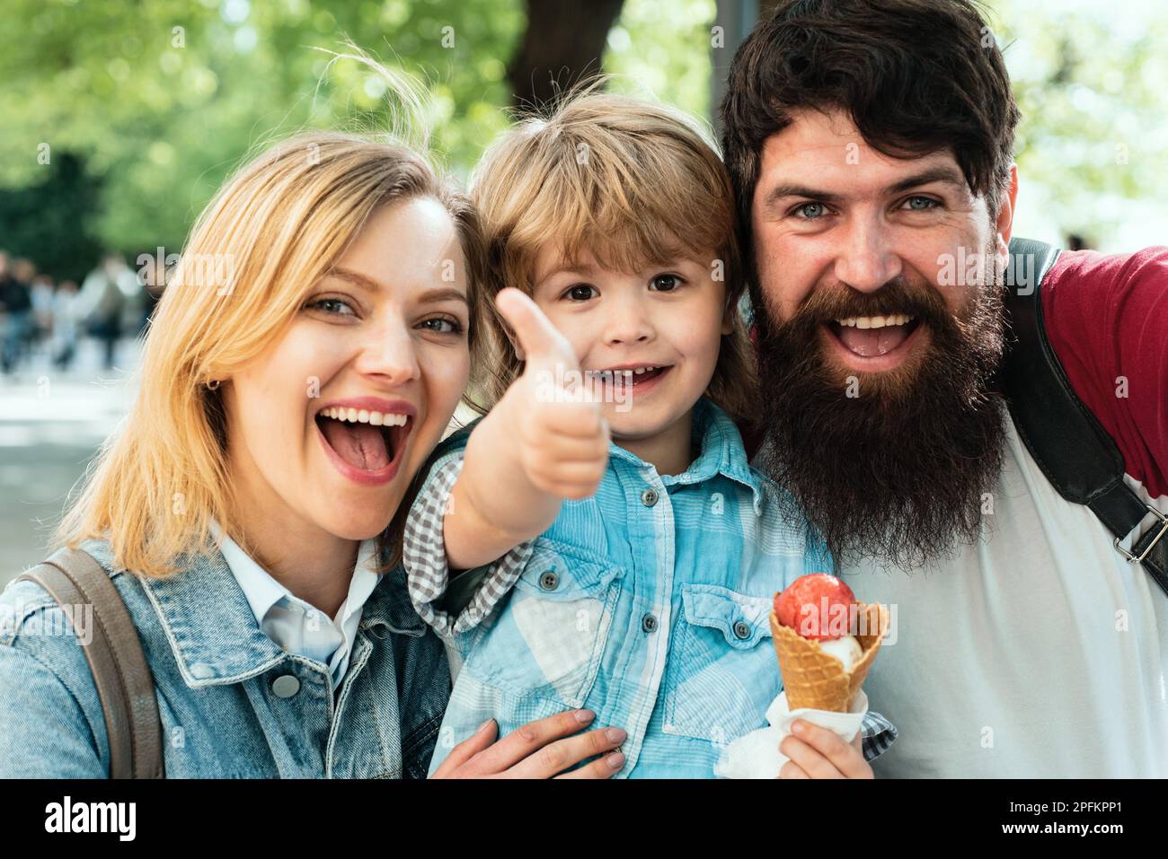 Family eat icecream outdoor. Junk food. Delicious summer ice cream ...
