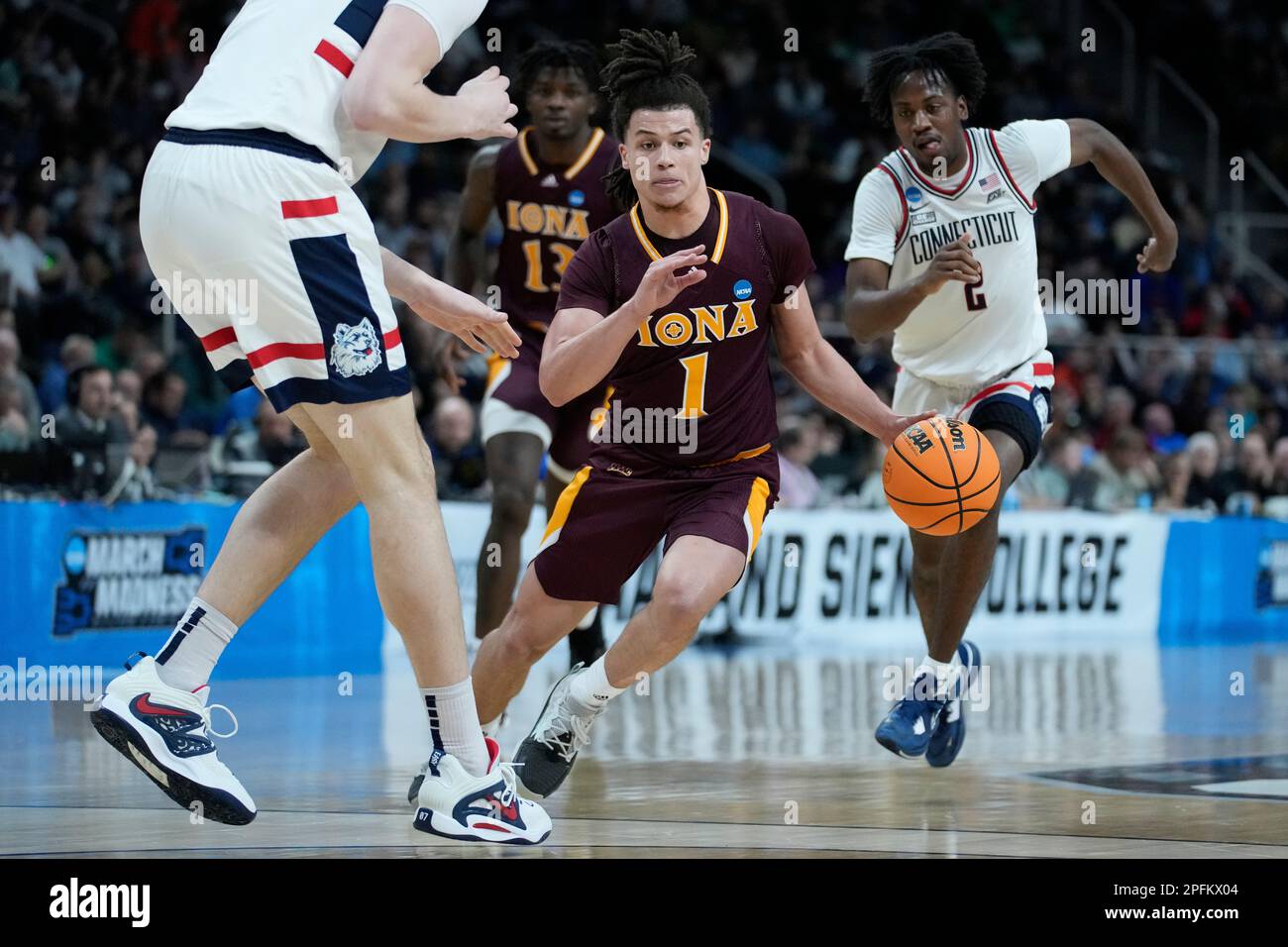 Iona's Walter Clayton Jr. (1) drives to the net in the second half of a ...