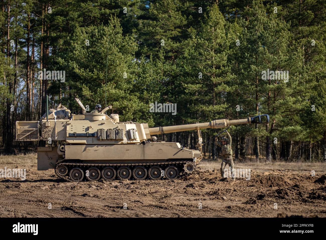U.S. Army Staff Sgt. Romello Johnson, left, Spc. Steven Surratt, and ...