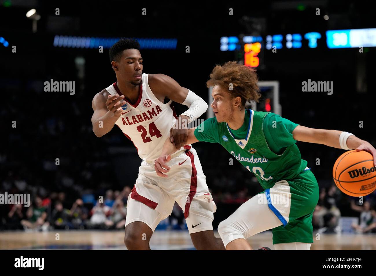 Alabama forward Brandon Miller (24) attempts to hold up Texas A&M ...