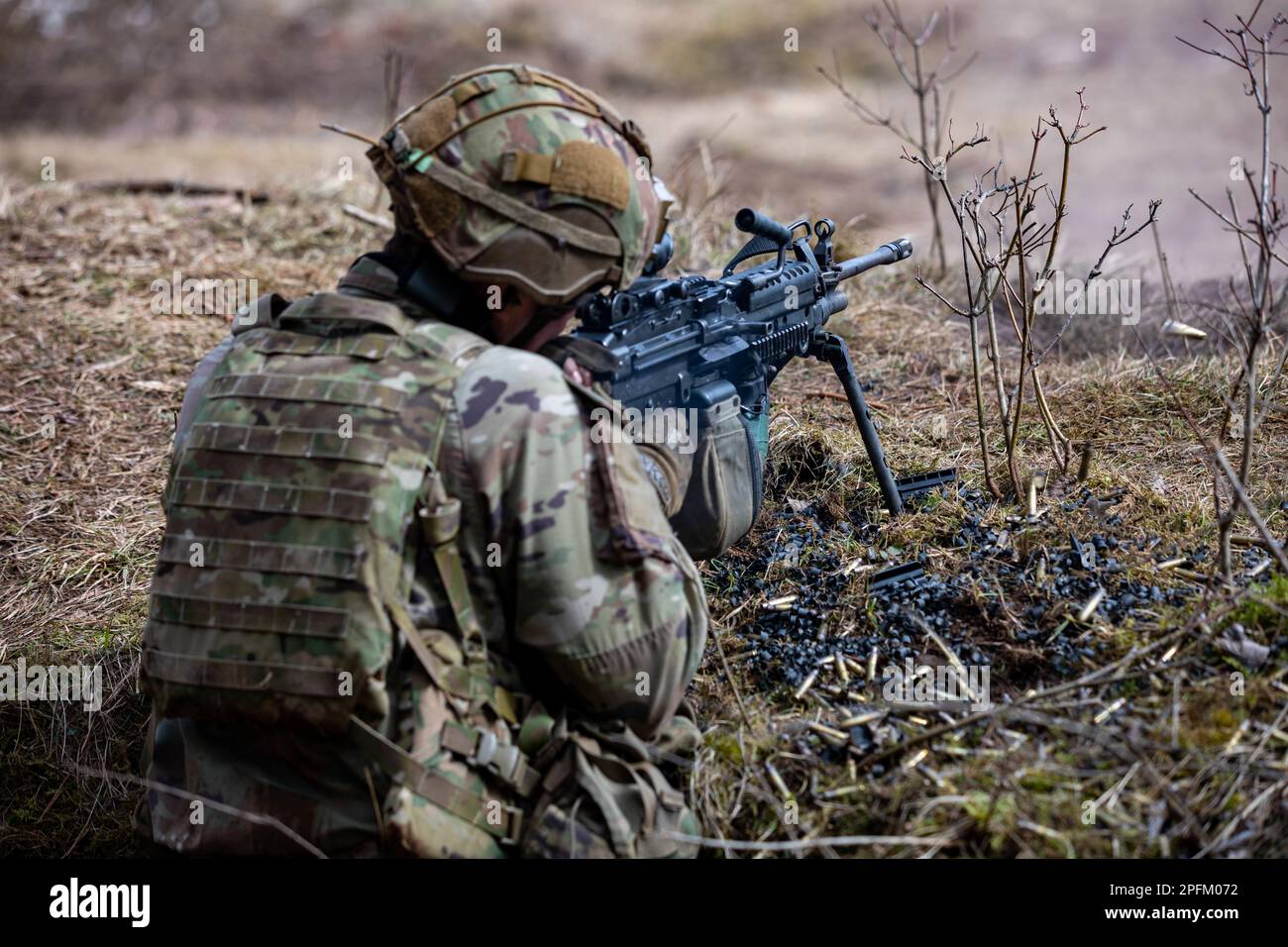 An M249 Squad Automatic Weapon (SAW) operator assigned to Battle ...