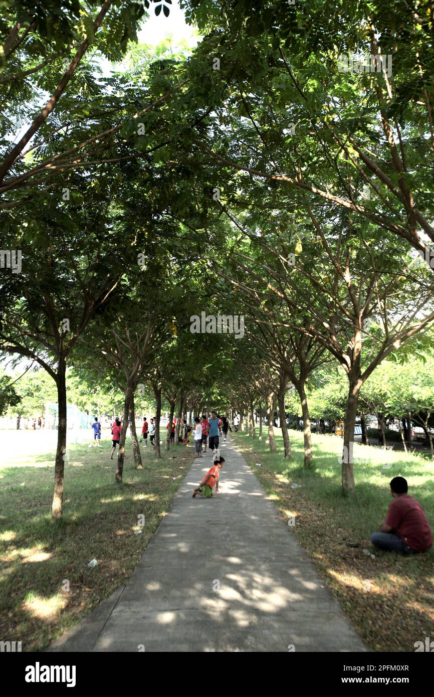 A concrete jogging track at Karebosi, a historic urban park in Makassar ...